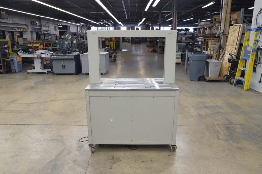 Lot #63: 2004 ITW Packaging (Omega) Strapping Machine - WireBids